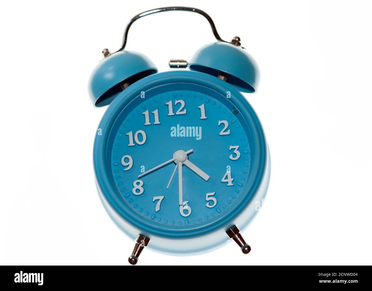 Isolated unbranded mechanical blue alarm clock Stock Photo - Alamy
