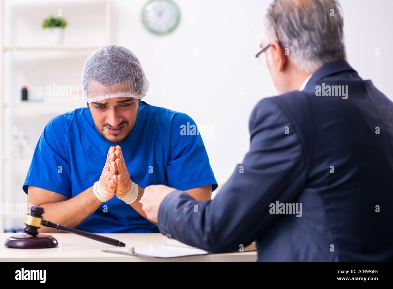 Doctor in courthouse meeting with advocate Stock Photo - Alamy