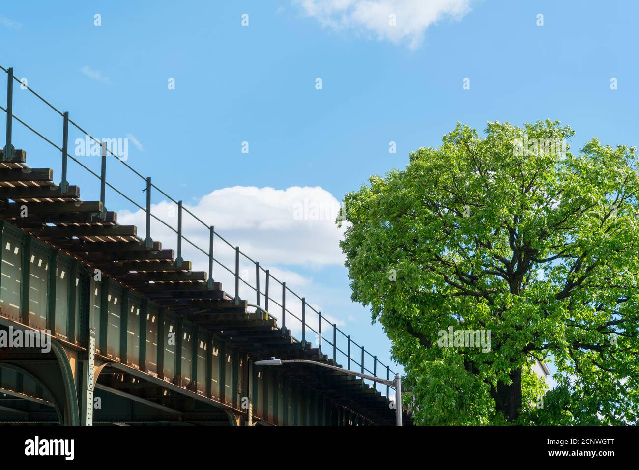 New York City subway runs on the elevated railway track at Queens New ...