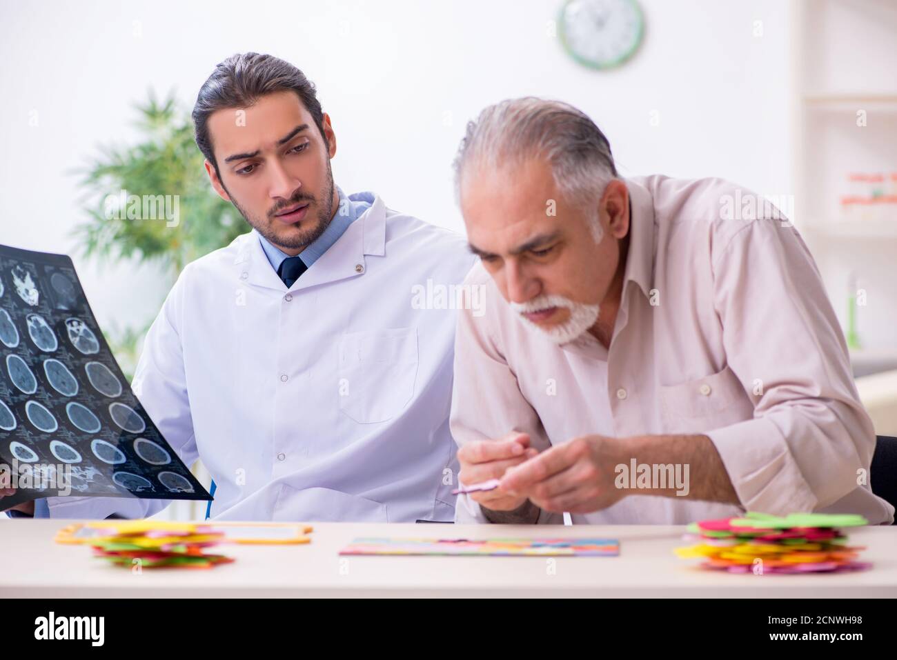 Doctor and patient suffering from the Alzheimer disease Stock Photo - Alamy