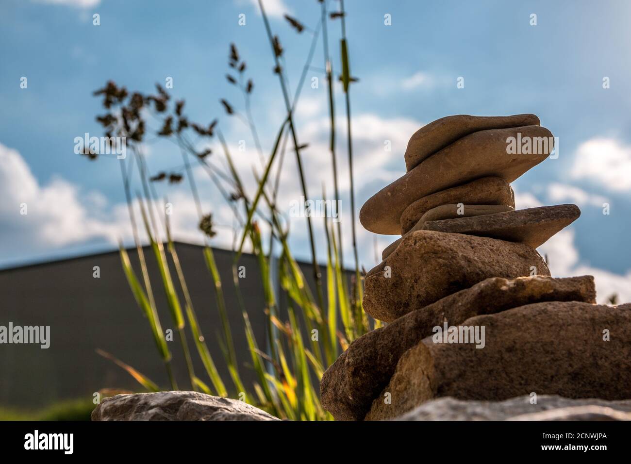 Little towers made of stones built on a rock Stock Photo - Alamy