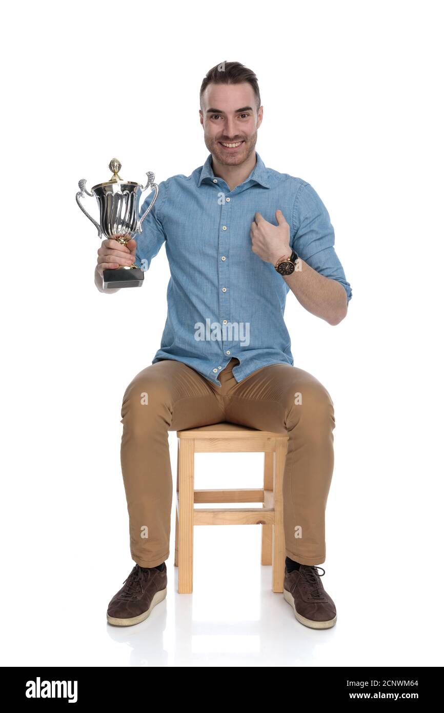 Presenting a trophy Cut Out Stock Images & Pictures - Alamy