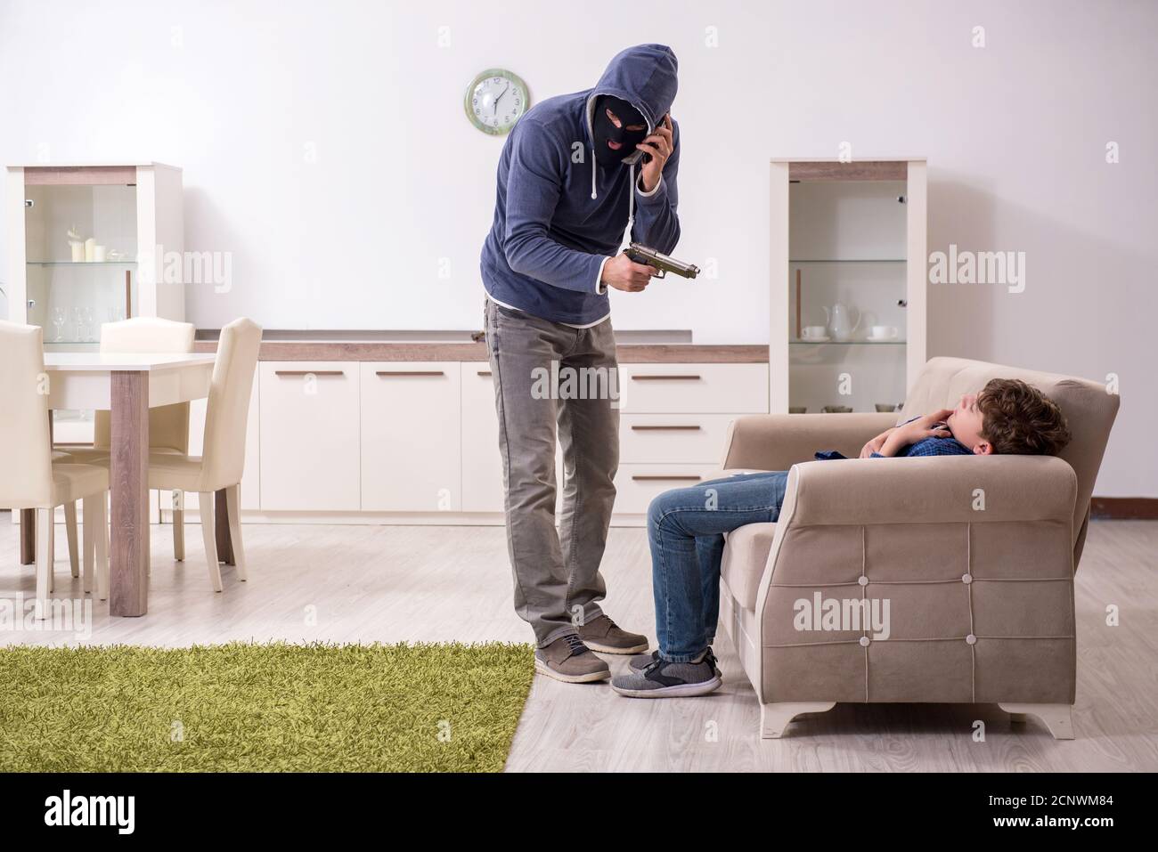 Child abduction concept with the young boy Stock Photo - Alamy