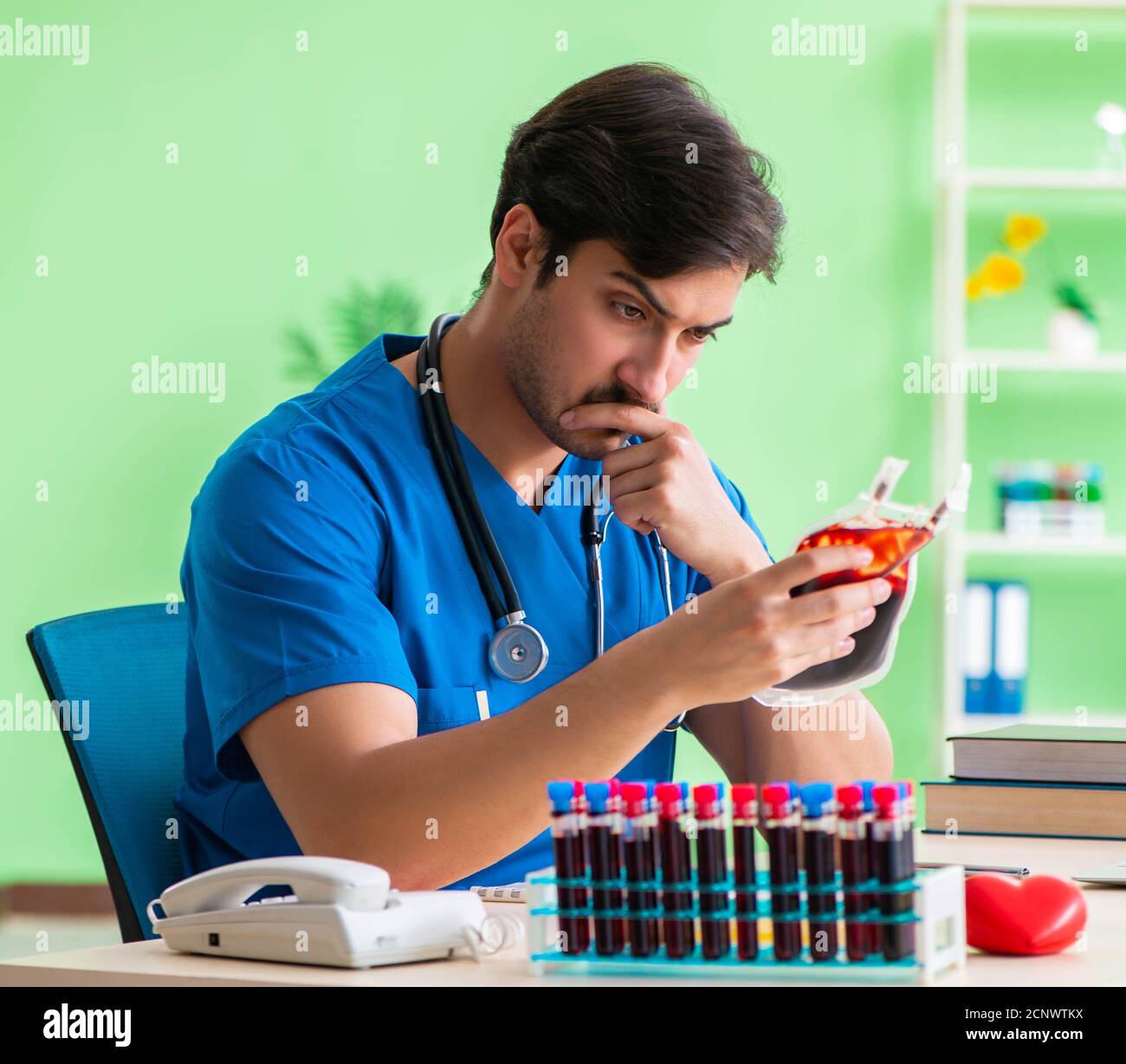 The doctor doing blood analysis in the lab Stock Photo - Alamy