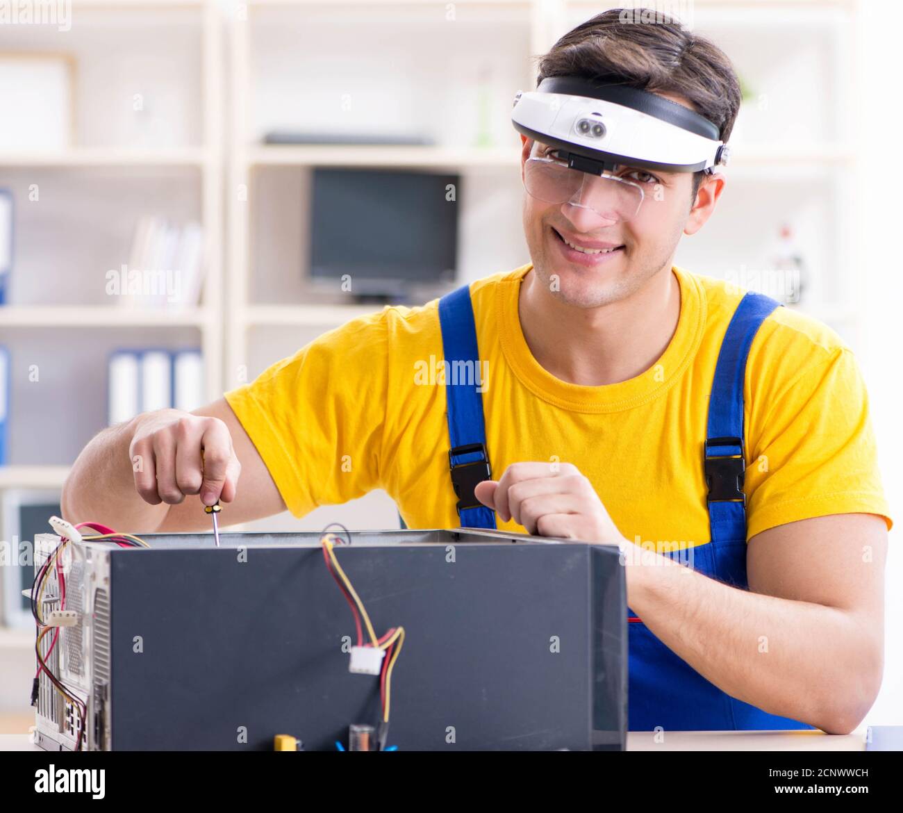 The computer repair technician repairing hardware Stock Photo - Alamy