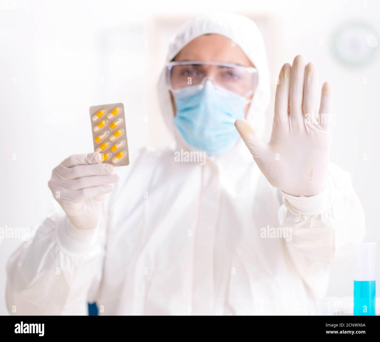 The lab assistant in drug synthesis concept Stock Photo - Alamy