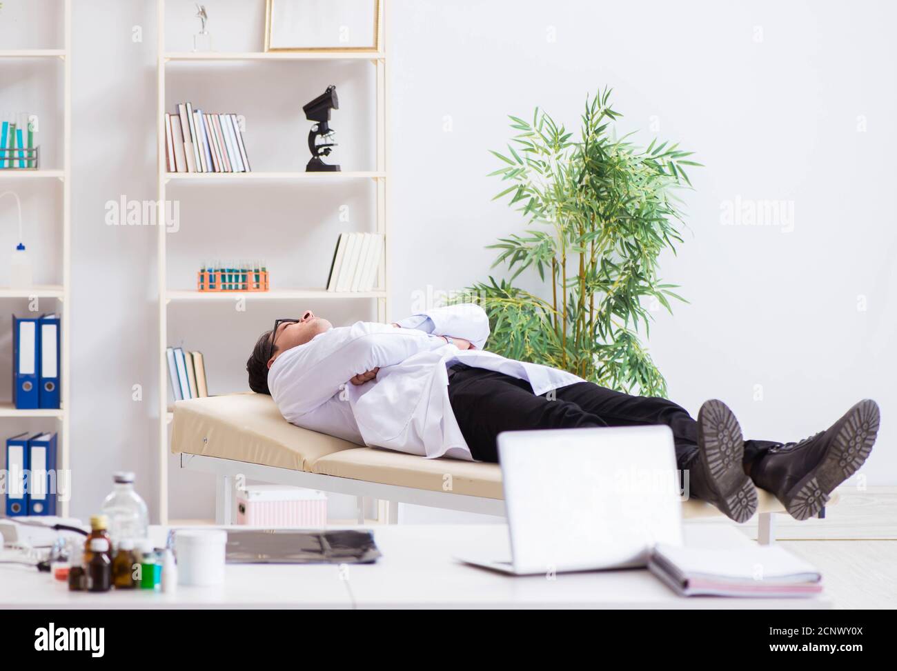 The doctor relaxing after complex surgery in hospital Stock Photo - Alamy