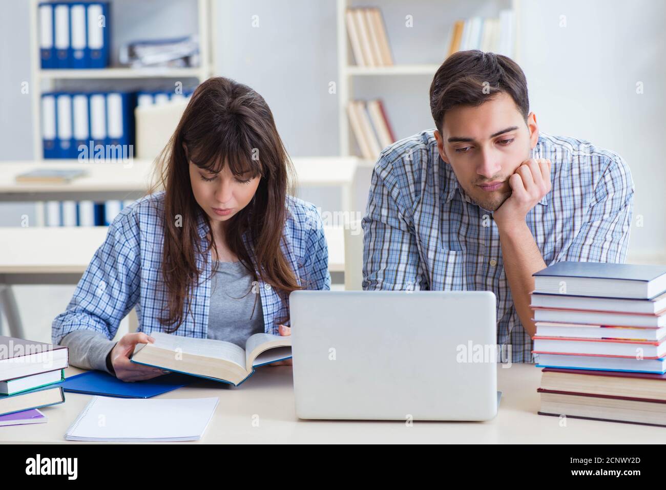 The students sitting and studying in classroom college Stock Photo - Alamy