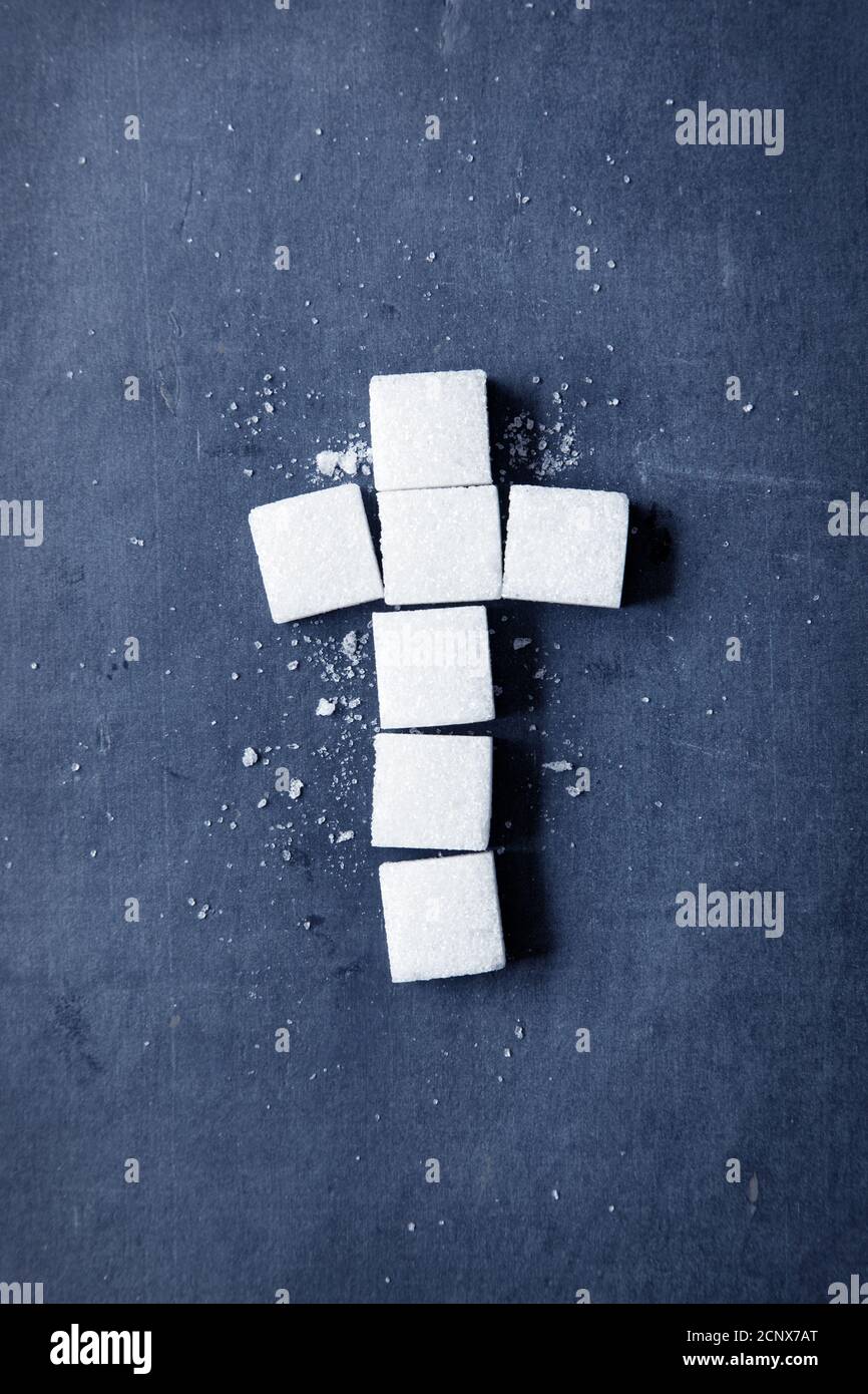 Sugar cubes, cross Stock Photo - Alamy