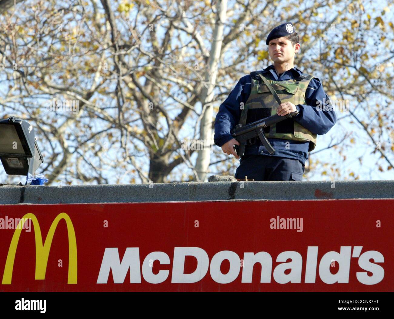 A TURKISH RIOT POLICE OFFICER OVERLOOKS AT A PEACE DEMONSTRATION FROM ...