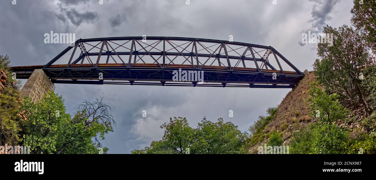 Panorama of an old trestle railroad bridge spanning over the southern ...