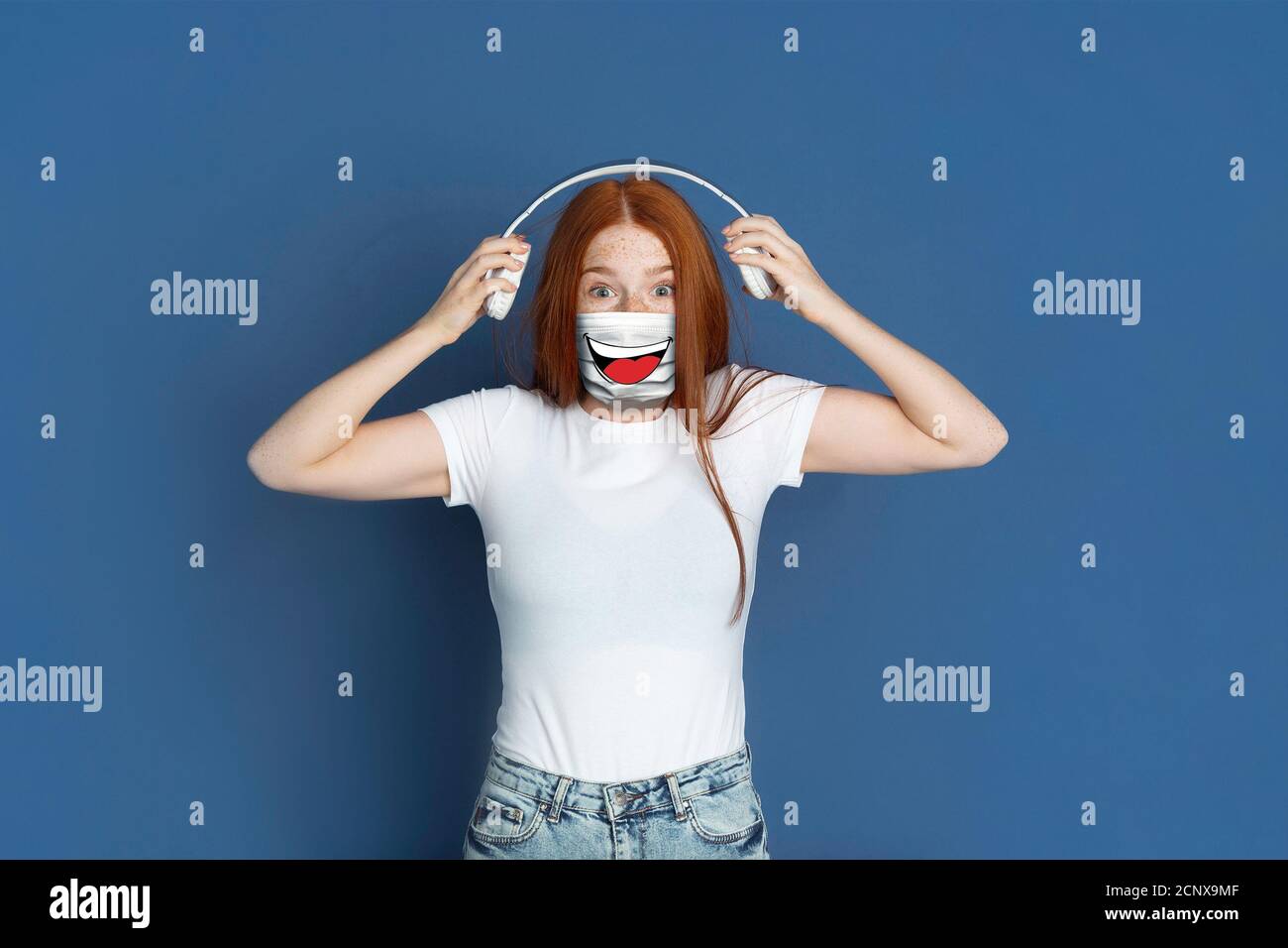 Laughting. Portrait of young girl with emotion on her protective face ...