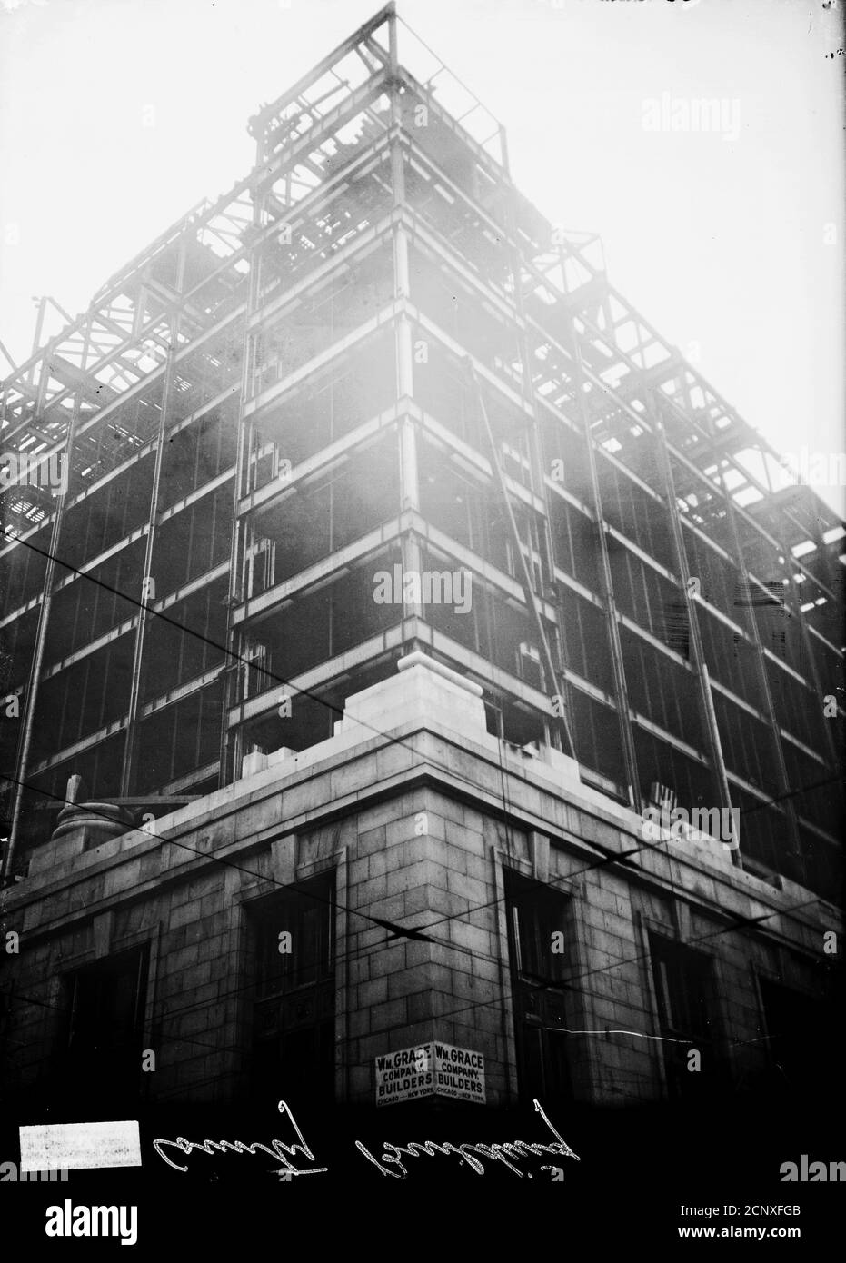 Framework of the County Building while under construction, looking up ...