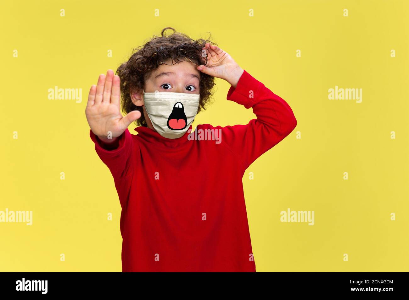 Shocked. Portrait of little boy with emotion on his protective face ...
