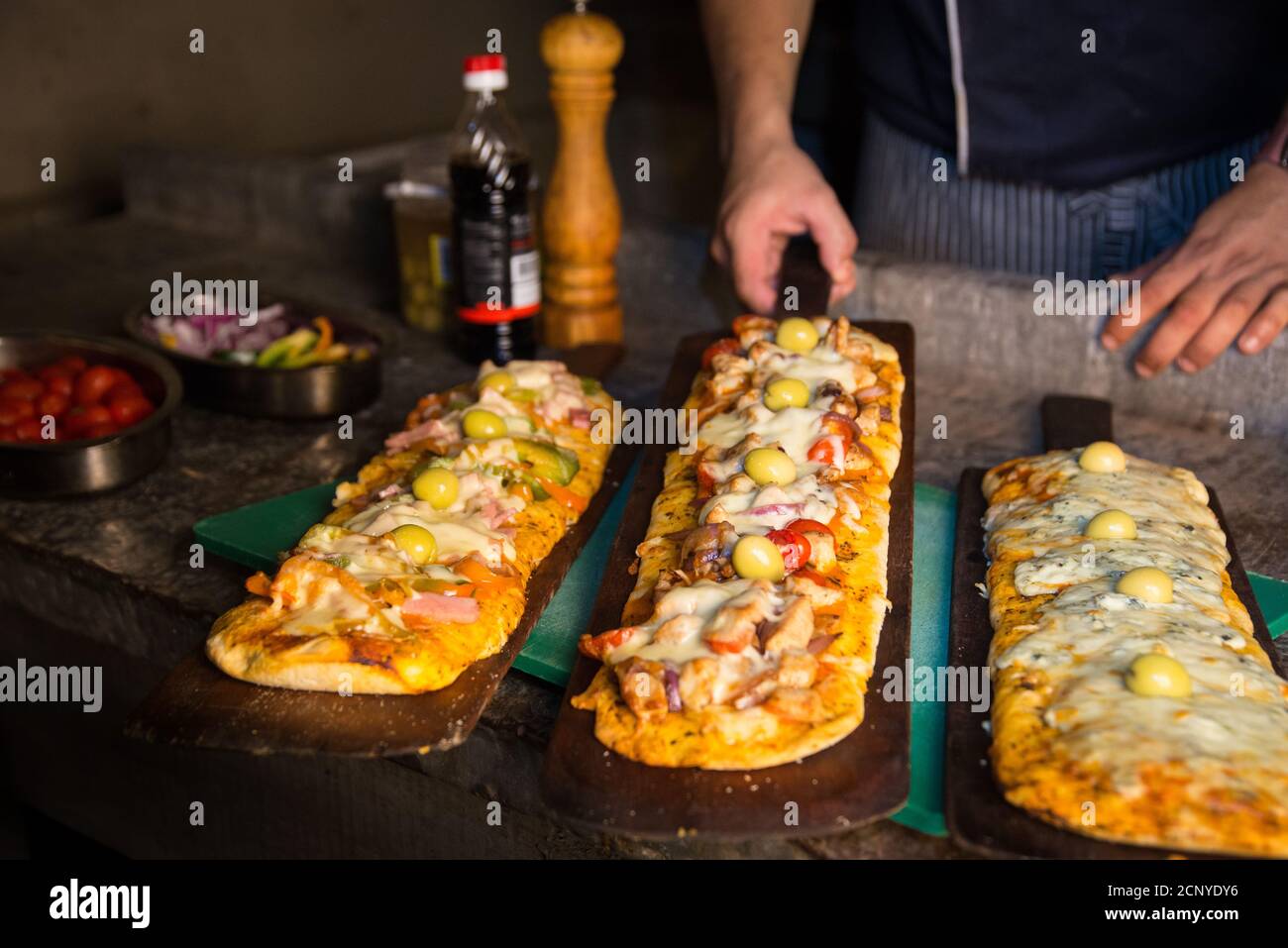 Rustic pizza cooked on grill for dinner Stock Photo - Alamy