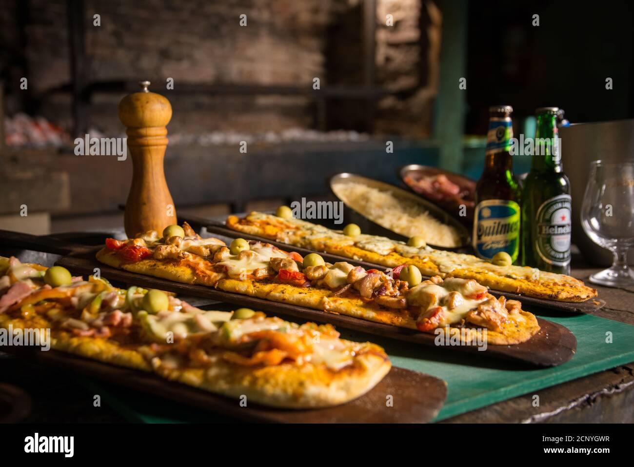 Rustic pizza cooked on grill for dinner Stock Photo - Alamy