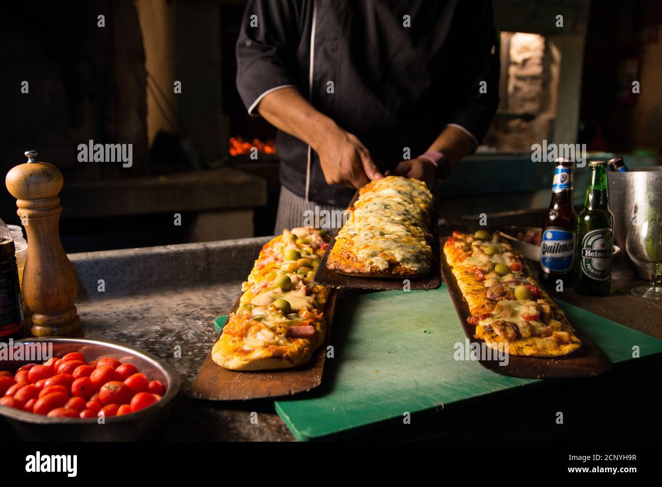 Rustic pizza cooked on grill for dinner Stock Photo - Alamy