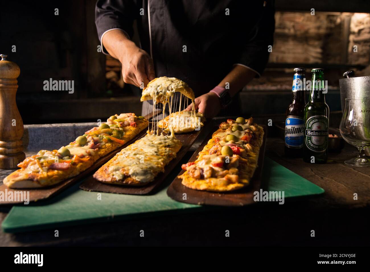 Rustic pizza cooked on grill for dinner Stock Photo - Alamy
