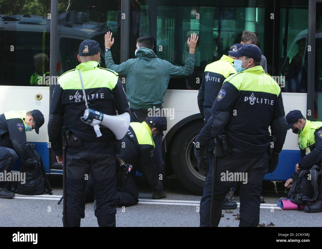 Dutch anti-riot police arrest two Extinction Rebellions activists ...