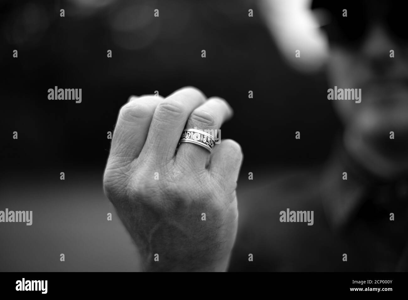 Grayscale shot of an elegant male ring on the nameless finger Stock ...