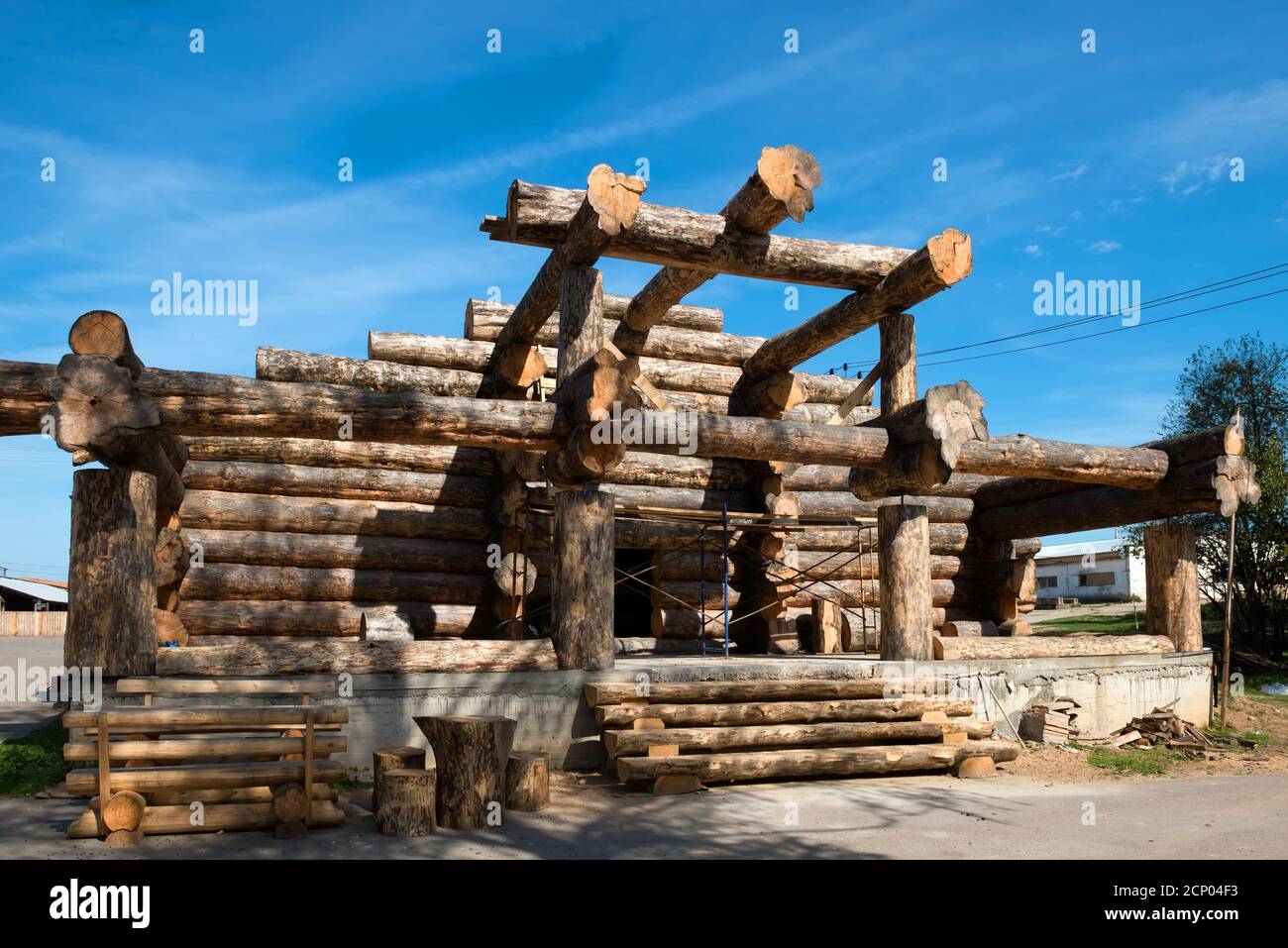 Construction of a wooden house from huge trees Stock Photo - Alamy