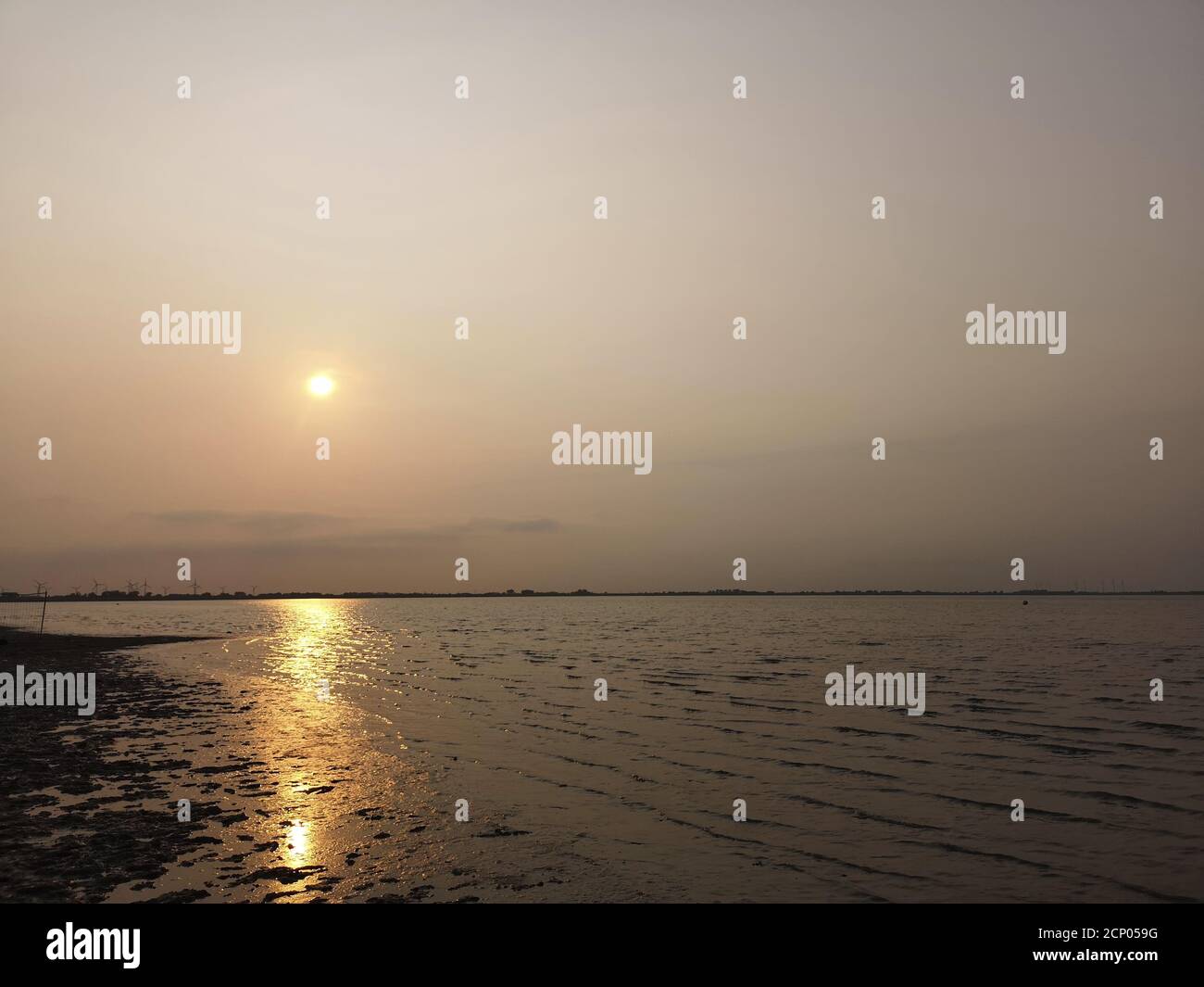 Beautiful sunset over a beach in Dangast, Germany Stock Photo - Alamy