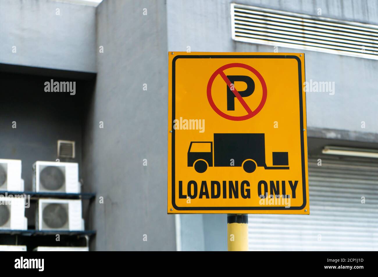 A special sign permitting parking only for loading goods Stock Photo ...