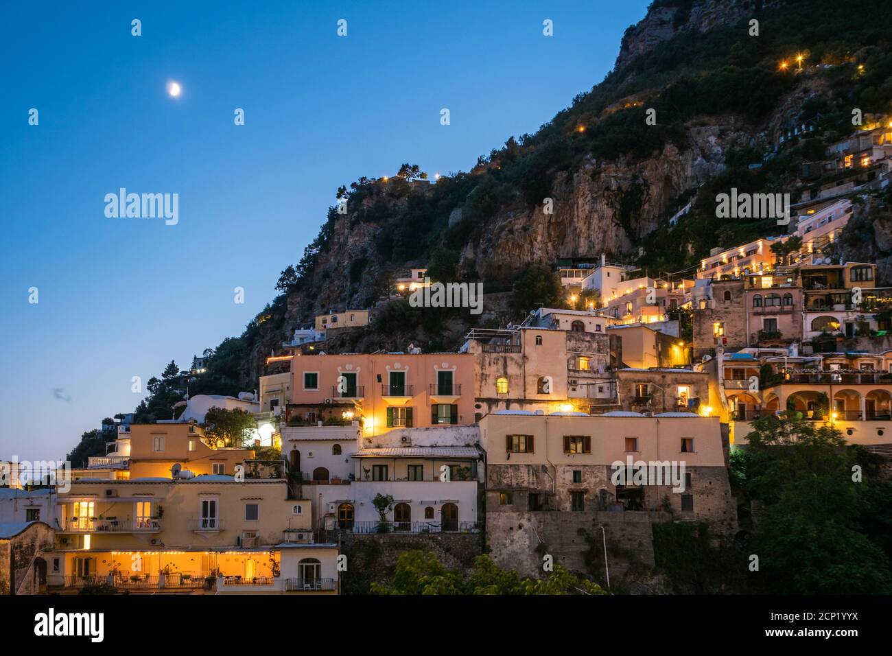 Positano Houses Illuminated in the Night or Evening on a Hill with Moon ...