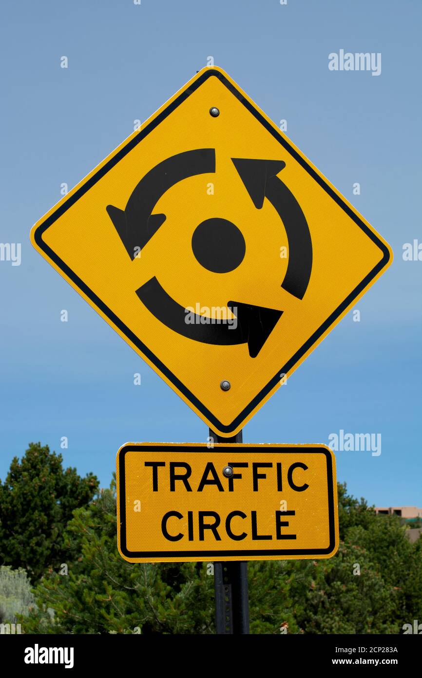 Roundabout with traffic sign hi-res stock photography and images - Alamy