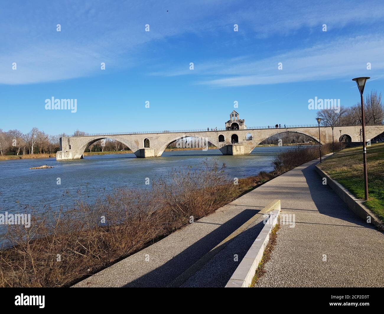 Beautiful shot of a big stone bridge on a blue sky background Stock ...