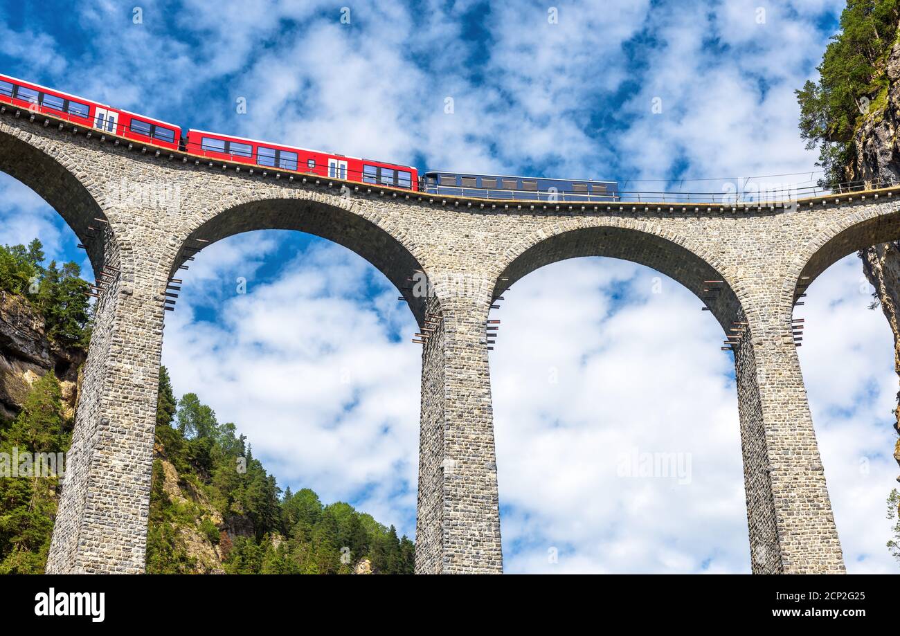 Train runs on Landwasser Viaduct, Filisur, Switzerland. This place is ...