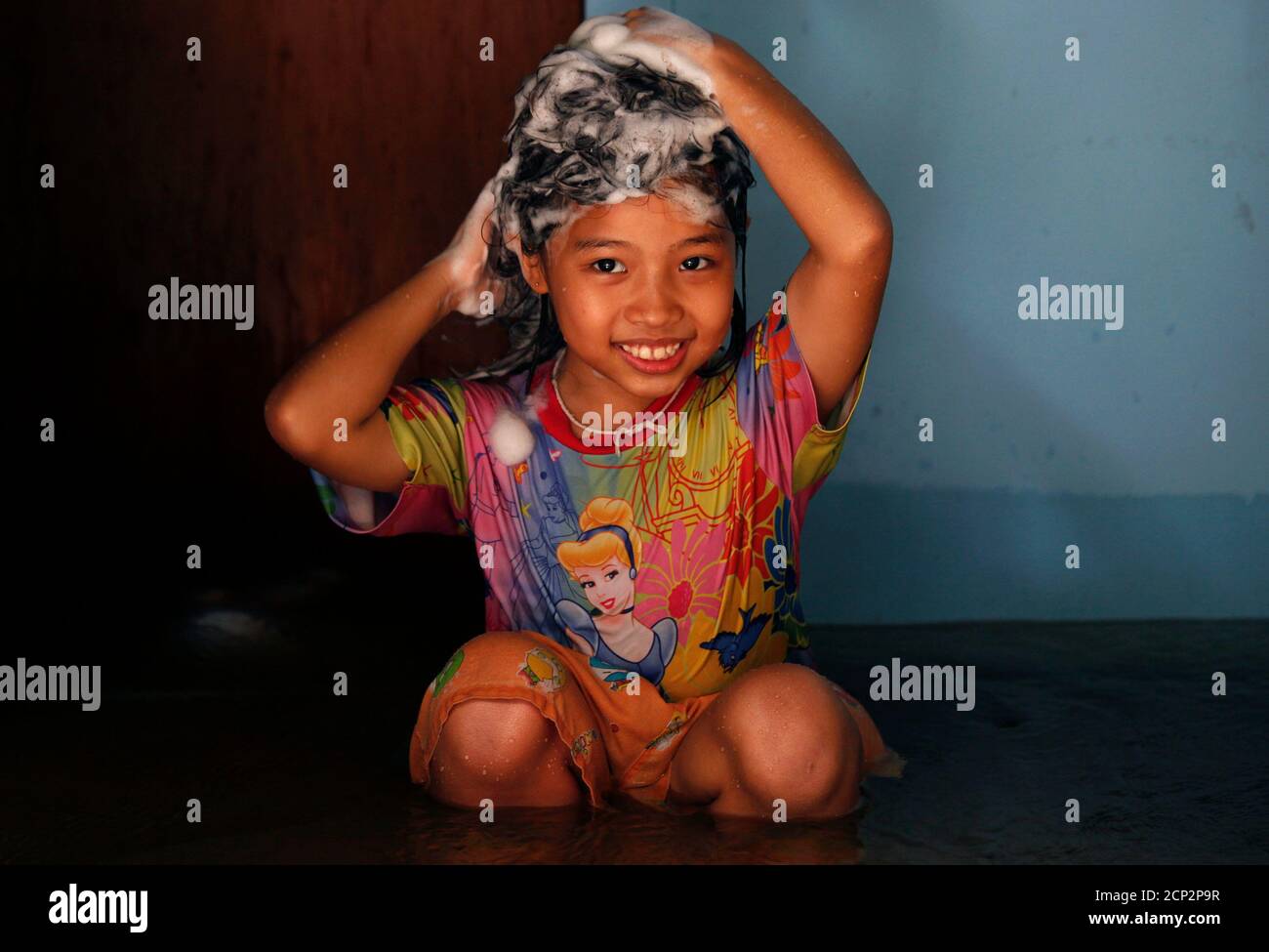 Girl smile in flood hi-res stock photography and images - Alamy