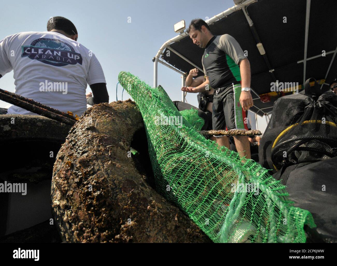 Cleaning waste out of the ocean hi-res stock photography and images - Alamy