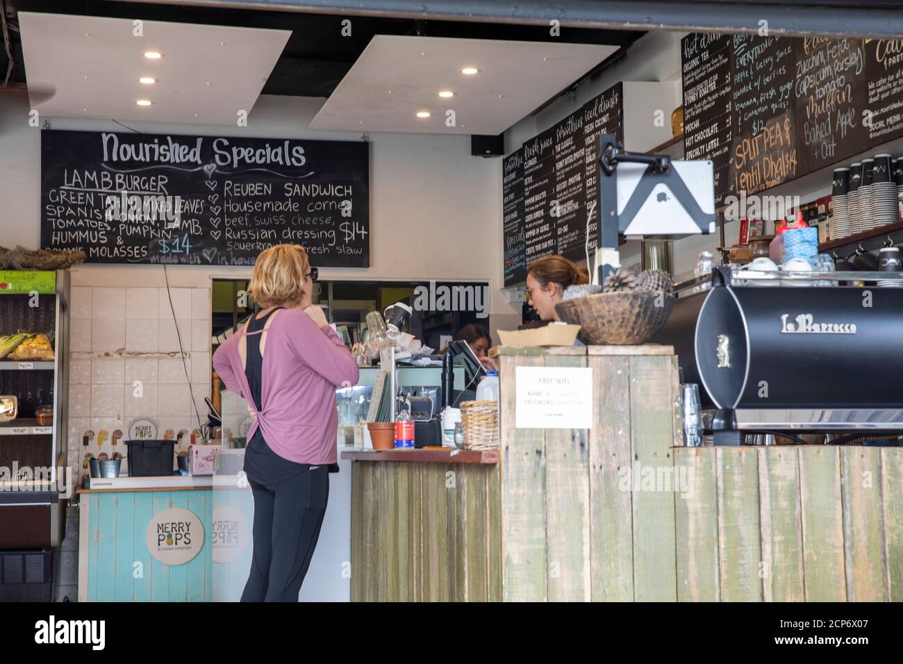 Woman ordering coffee shop hi-res stock photography and images - Alamy