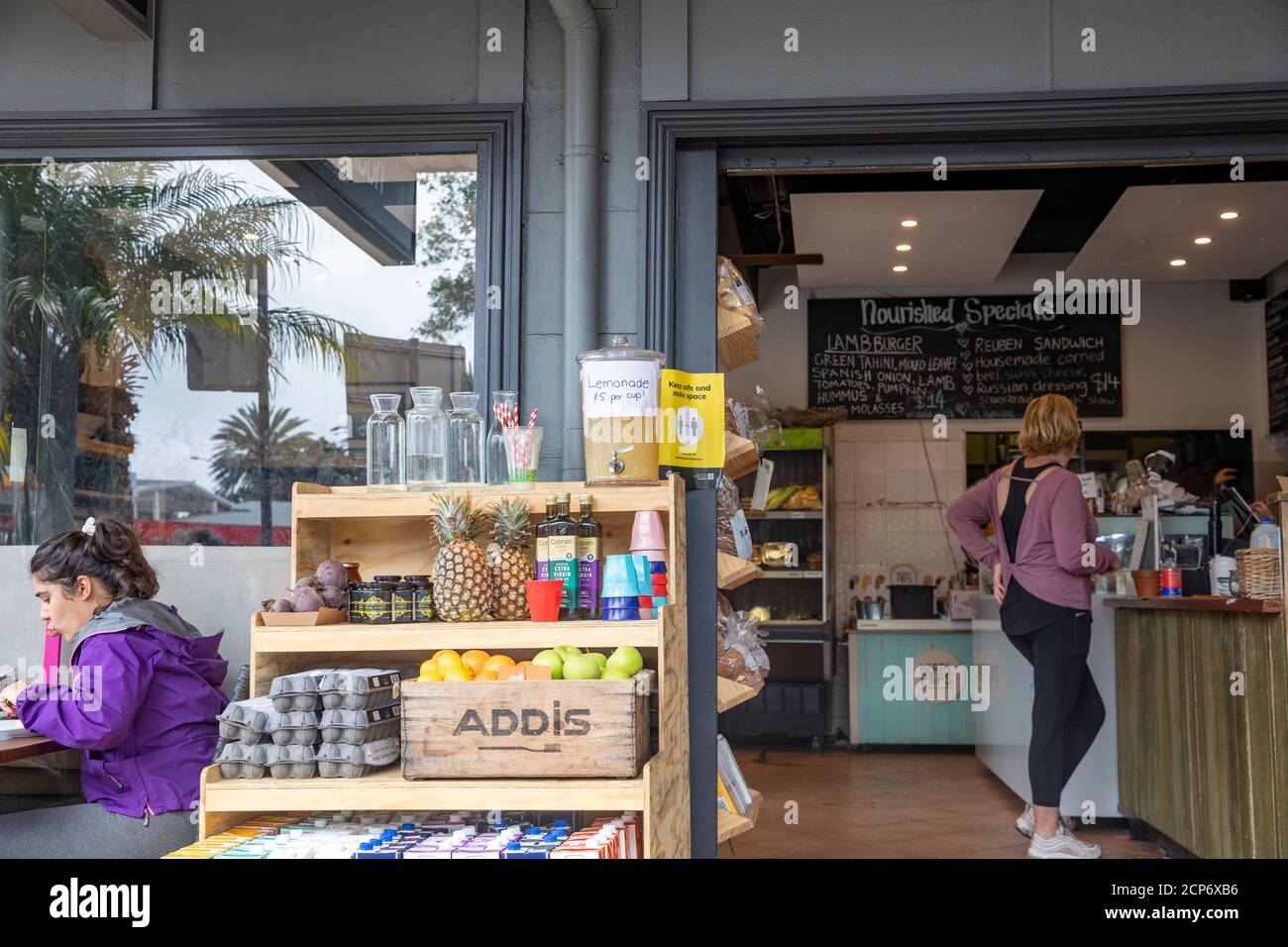 Australian cafe, lady ordering food and drinks from a Sydney cafe in ...