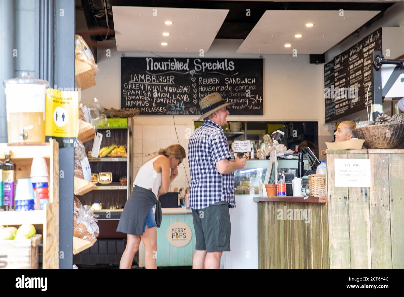 Australian man in a Sydney cafe ordering food and drink,Sydney ...