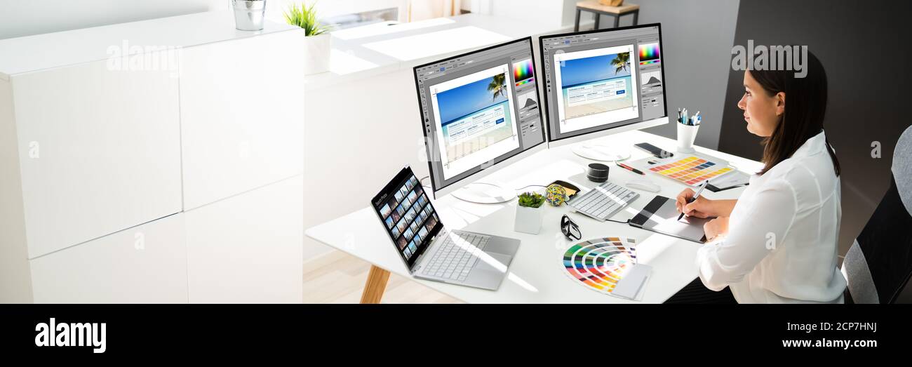 Graphic Designer Artist Working On Multiple Computer Screens Stock ...