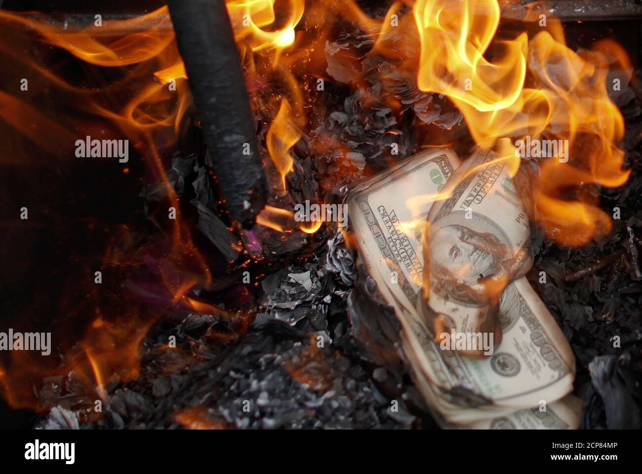 Fake banknotes to be burnt as hi-res stock photography and images - Alamy