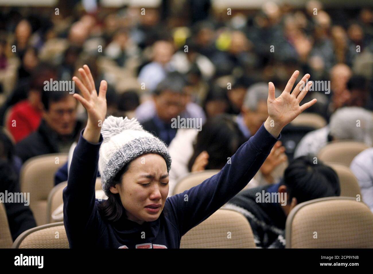 Praying hands joint hi-res stock photography and images - Alamy