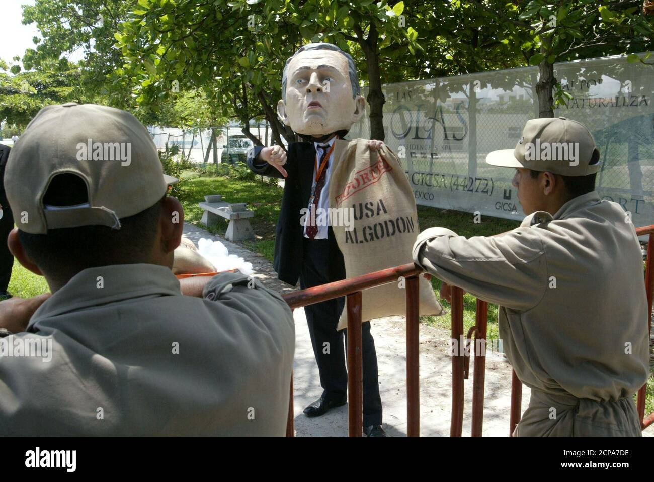 Wearing george bush mask hi-res stock photography and images - Alamy
