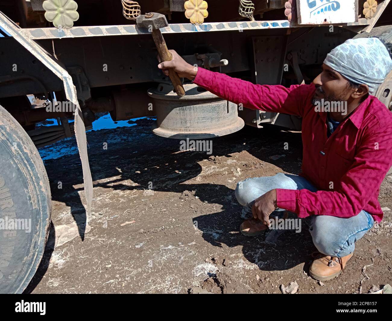 DISTRICT KATNI, INDIA - DECEMBER 09, 2019: An indian automobile worker ...