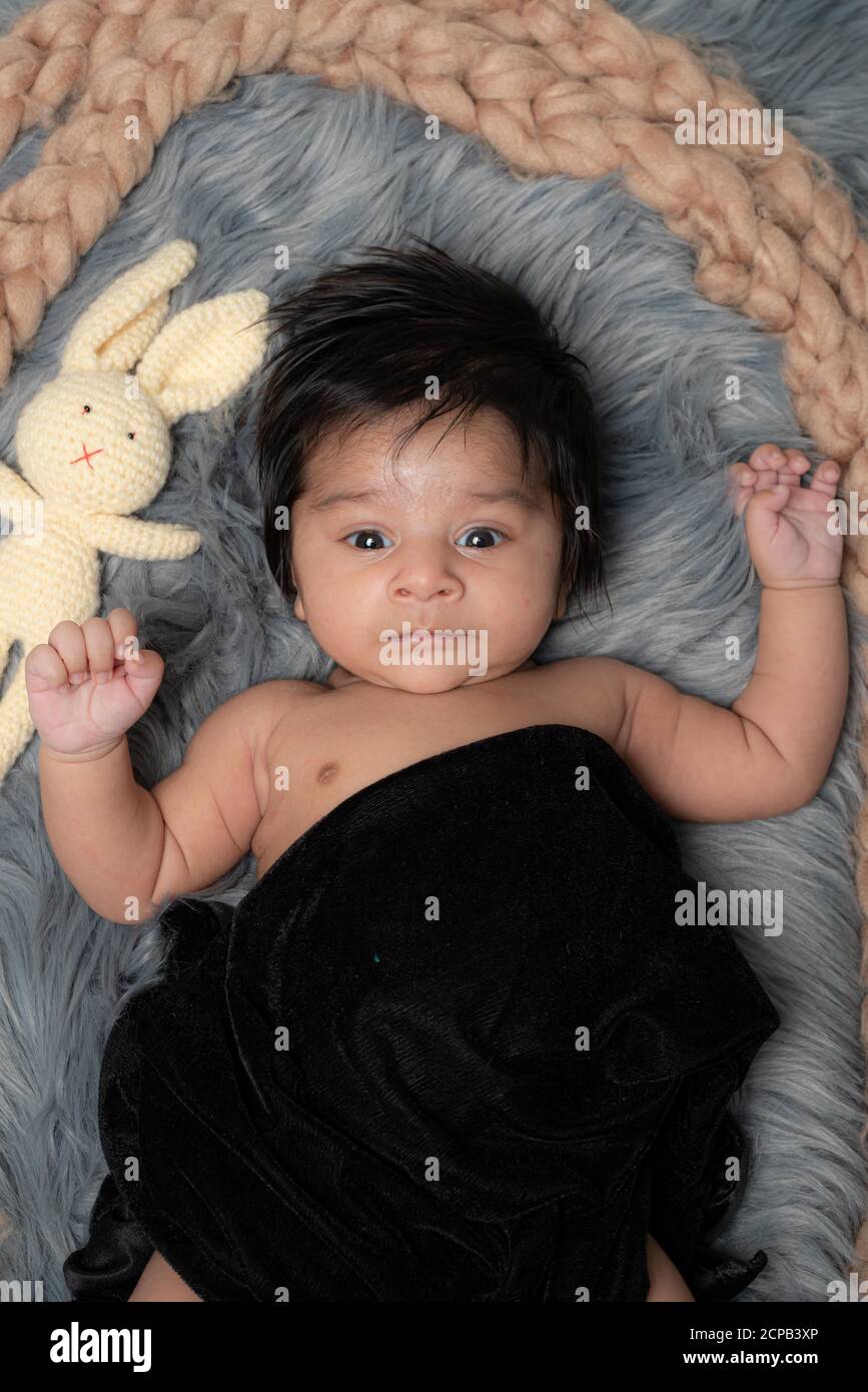 baby on grey background close-up, design element, space for text, with ...