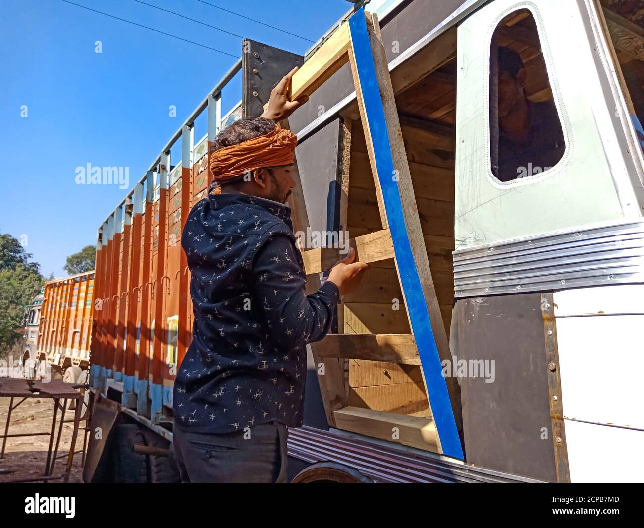 DISTRICT KATNI, INDIA - DECEMBER 09, 2019: An indian male mechanic ...