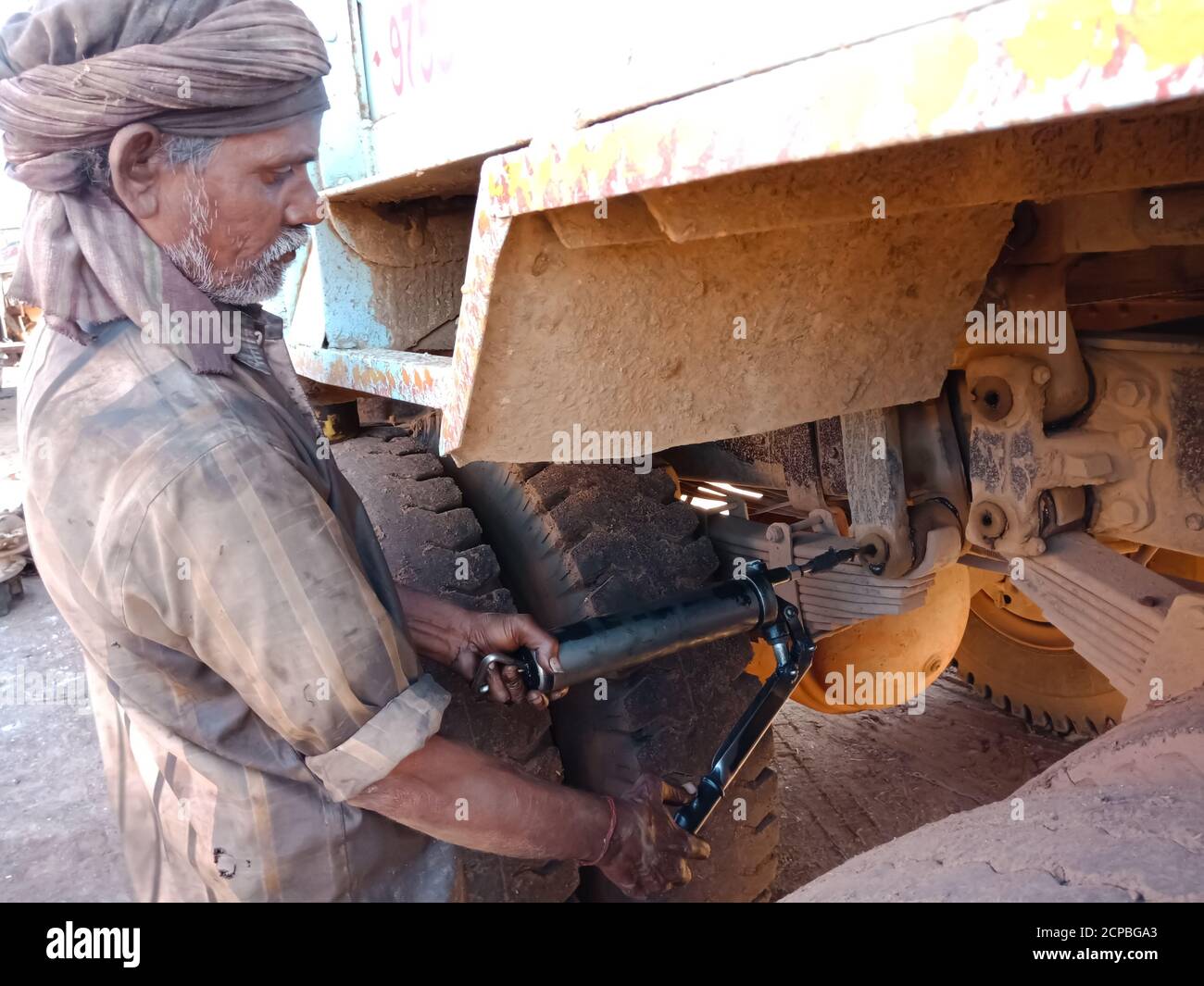 India industrial grease hi-res stock photography and images - Alamy