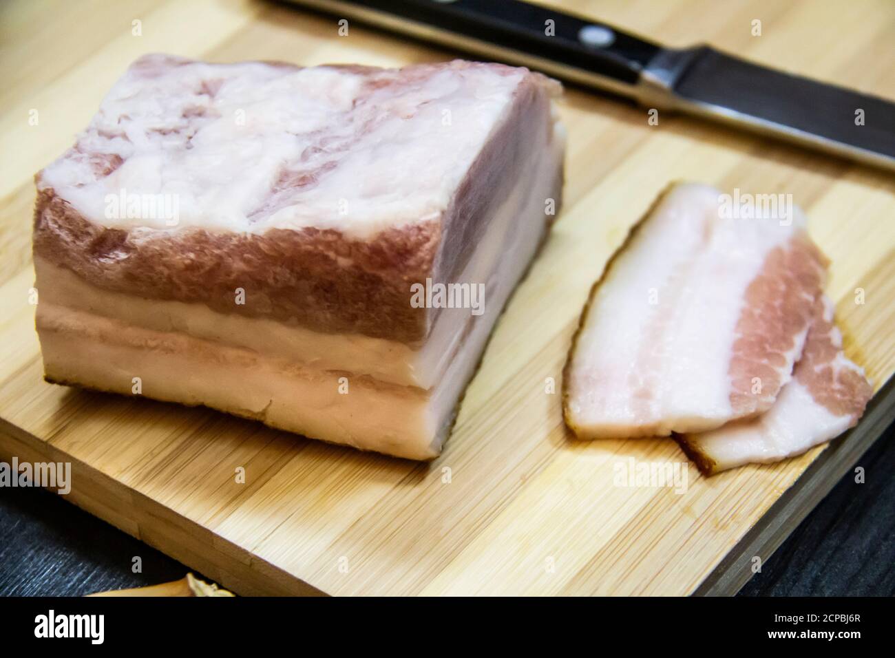 Ukrainian traditional meal. Slices of salted pork lardon with garlic ...