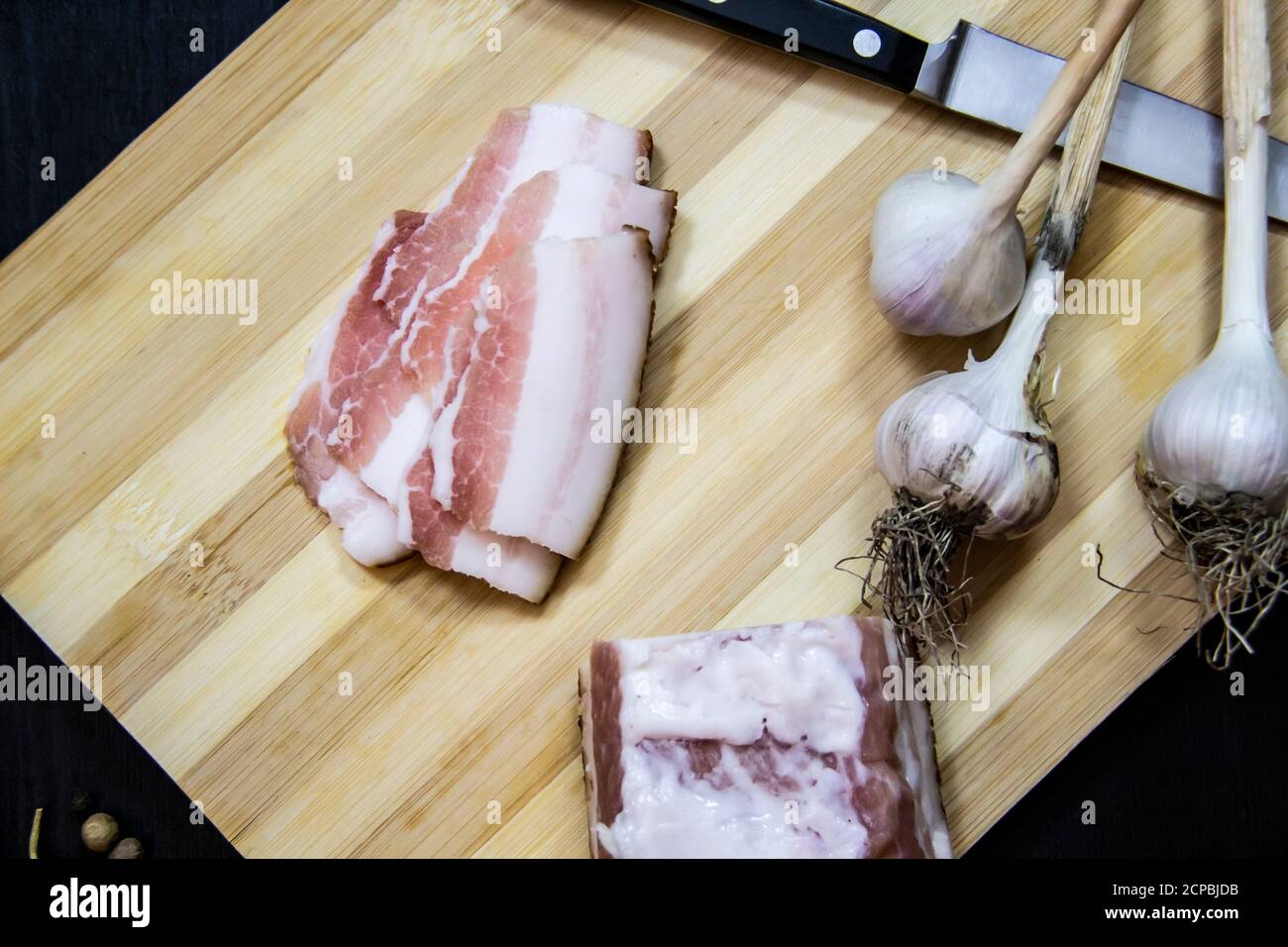 Ukrainian traditional meal. Slices of salted pork lardon with garlic ...