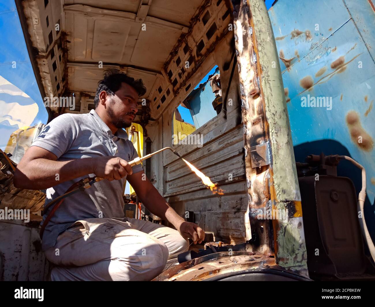 DISTRICT KATNI, INDIA - DECEMBER 14, 2019: An indian Mechanic holding ...