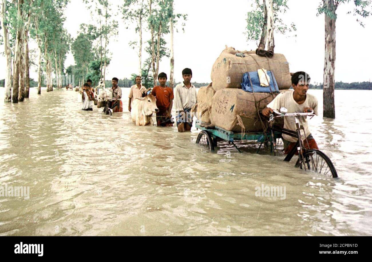 Villagers wade hi-res stock photography and images - Alamy