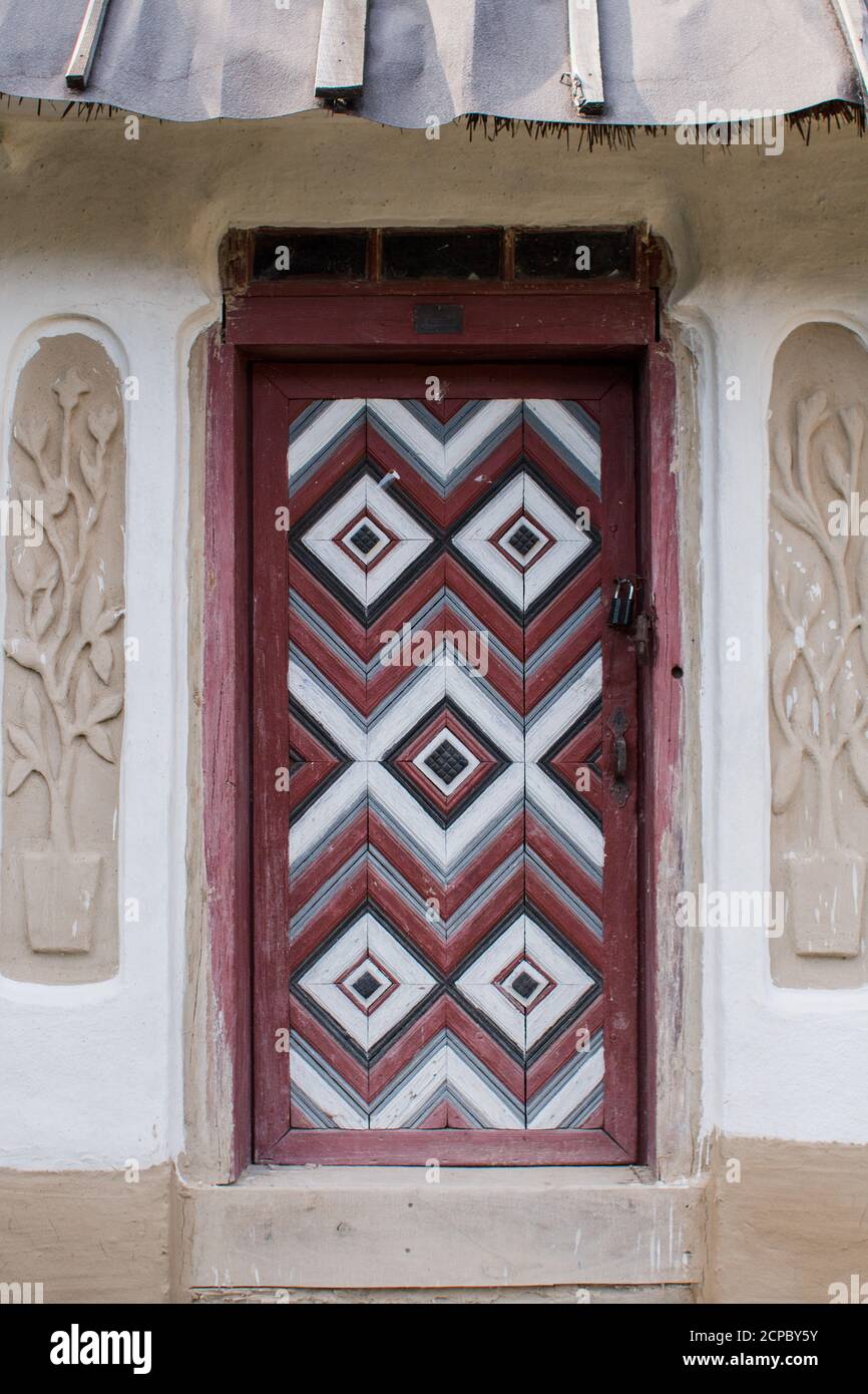 an old wooden door with patterns Stock Photo - Alamy