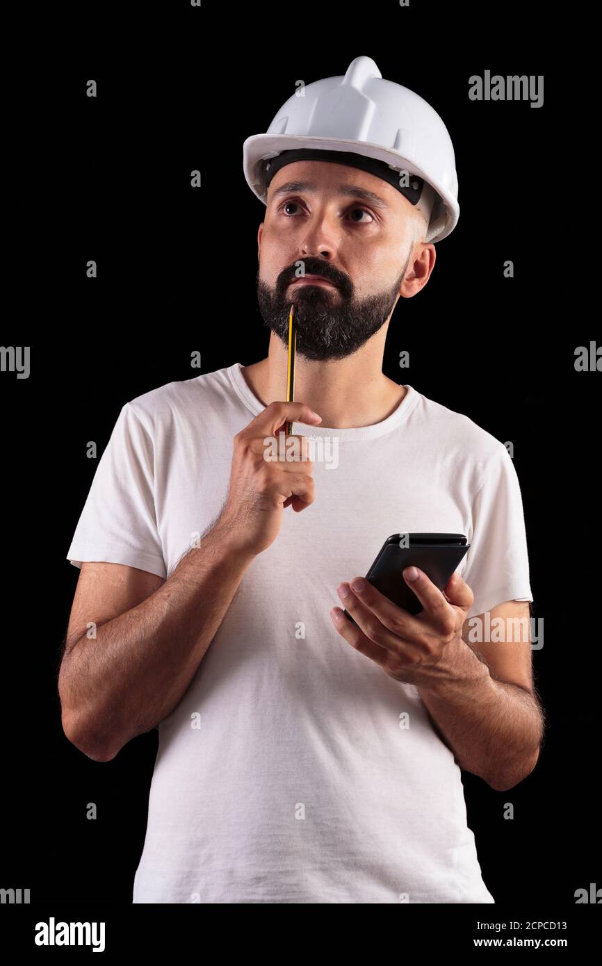 Construction worker blue thinking hi-res stock photography and images - Alamy